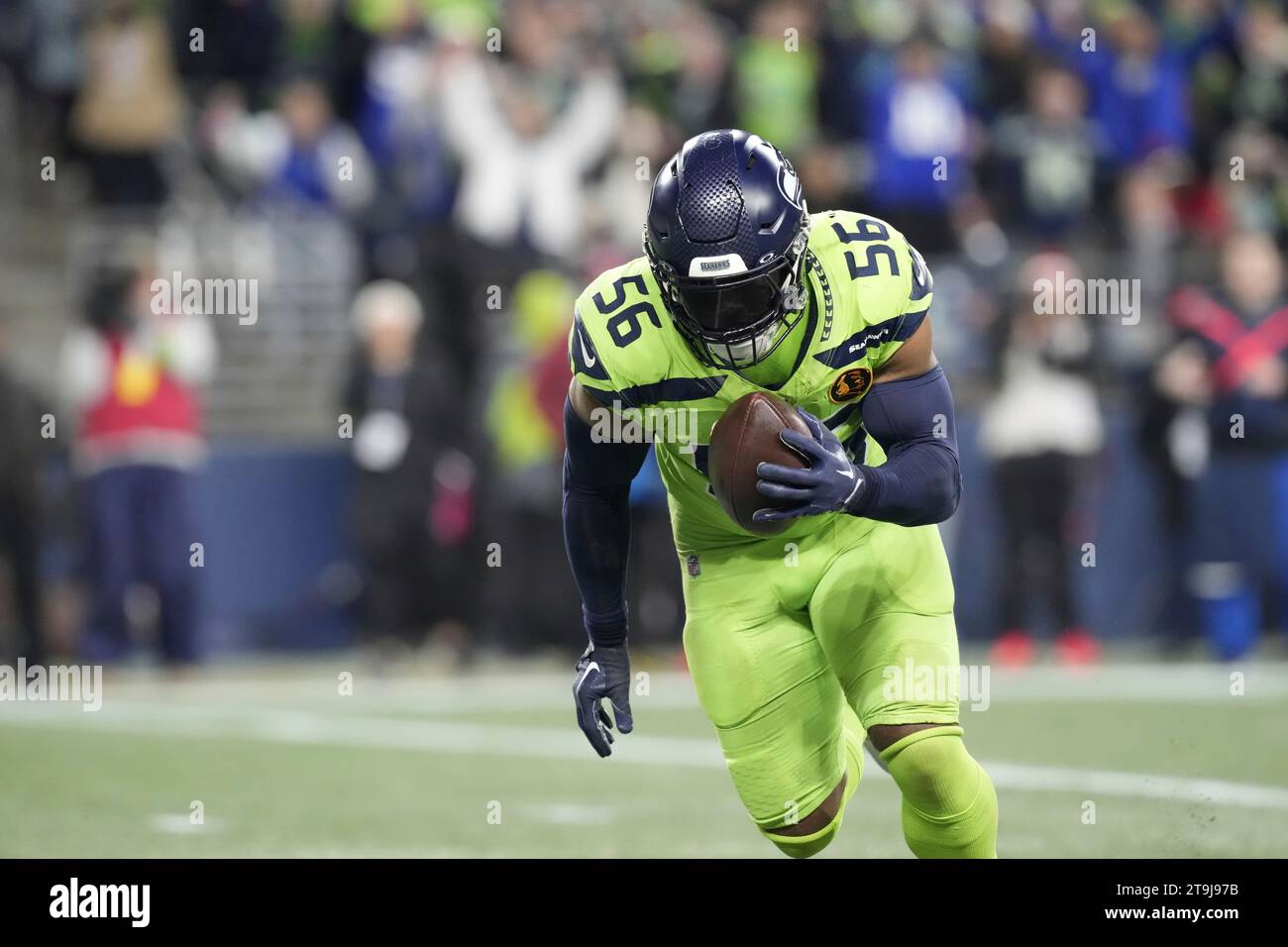 Seattle Seahawks linebacker Jordyn Brooks (56) makes a pick six during ...
