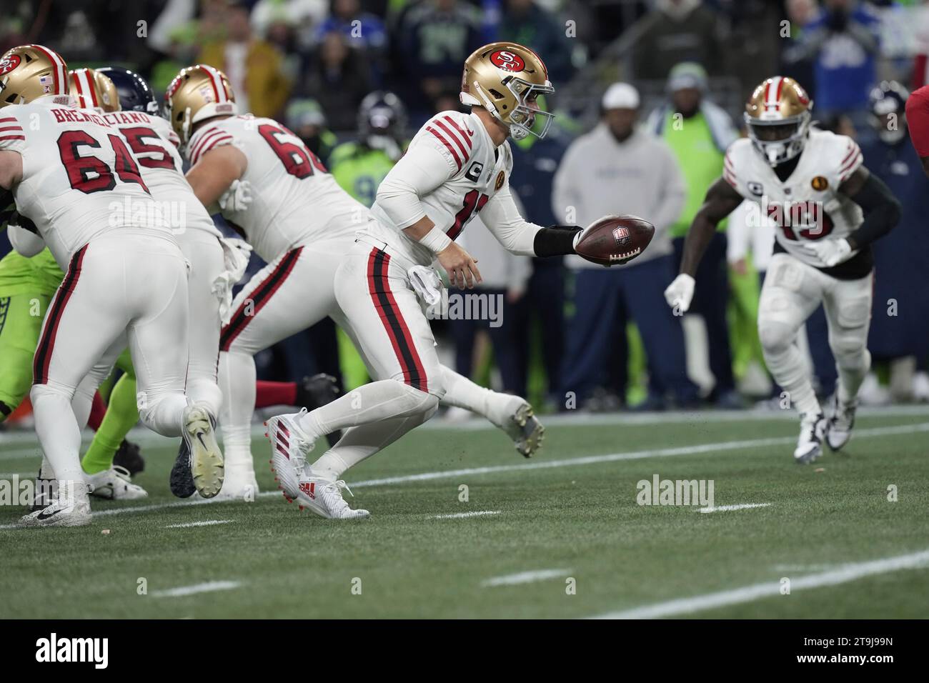 San Francisco 49ers quarterback Brock Purdy (13) looks to hand off the ...