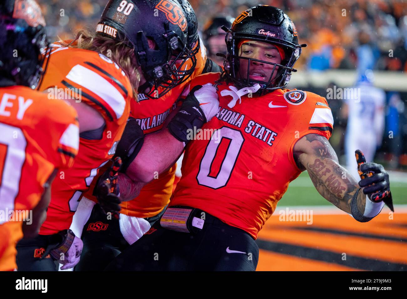 Oklahoma State running back Ollie Gordon II (0) celebrates with ...