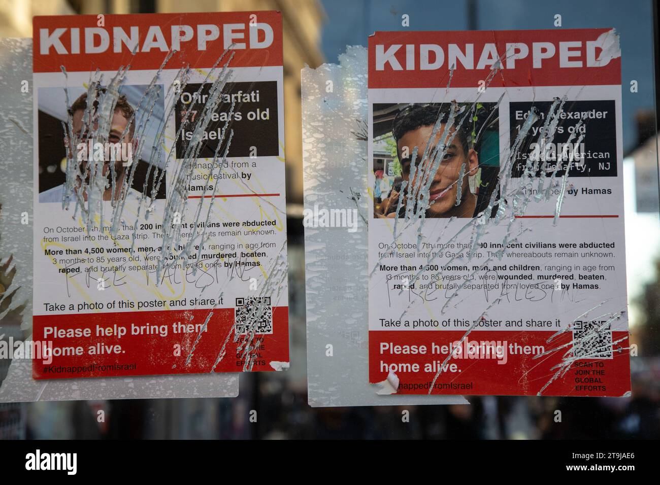 London, UK. 25th Nov, 2023. A defaced ‘kidnapped flier showing Israeli ...