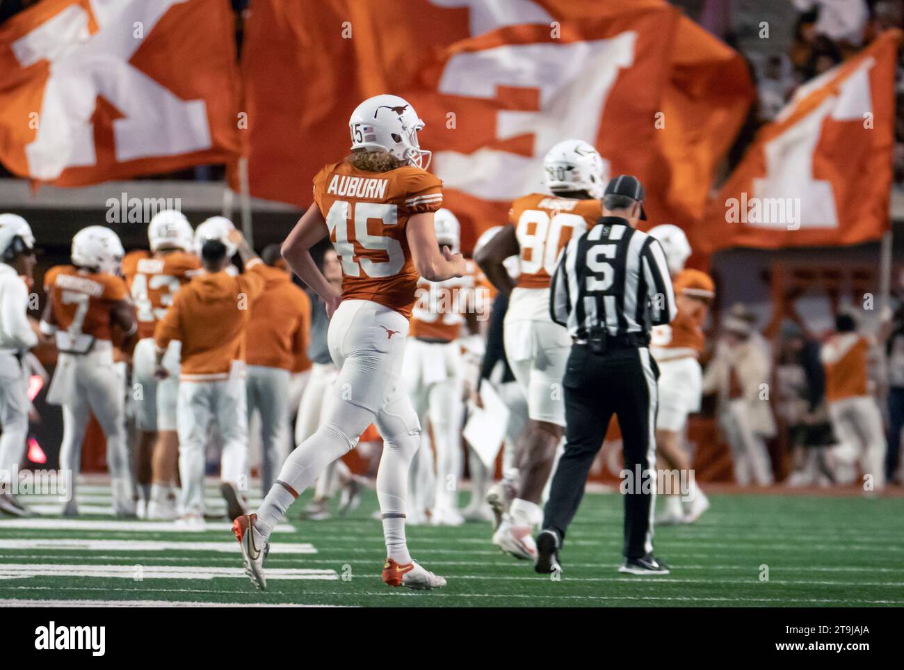 Texas kicker Bert Auburn leaves the field after kicking a field goal ...