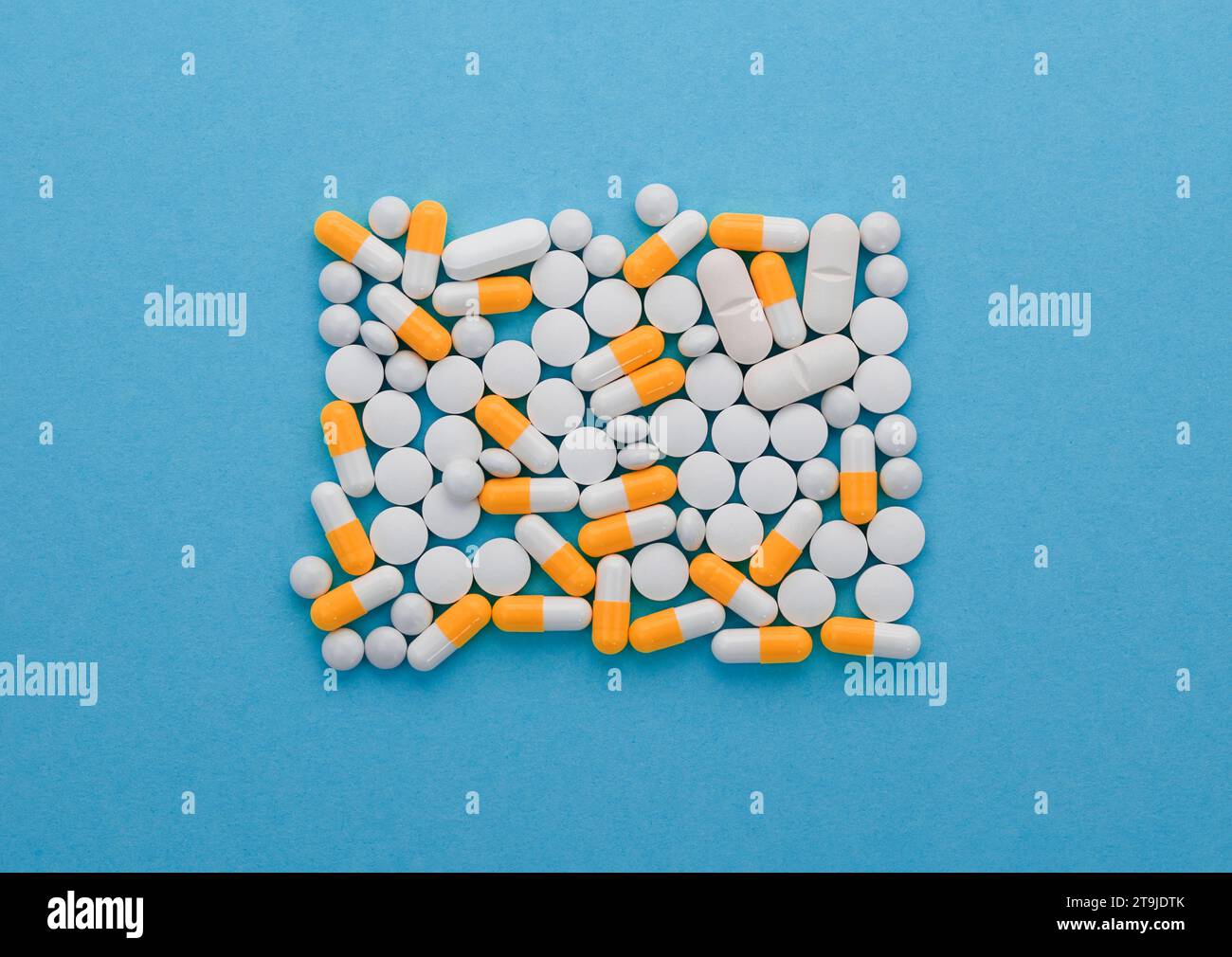 Different medicinal pills are arranged in a square, from above. Medical ...