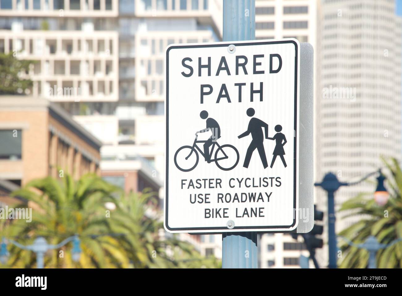 Graphic Rescourses, Shared Path sign above busy street in busy city ...