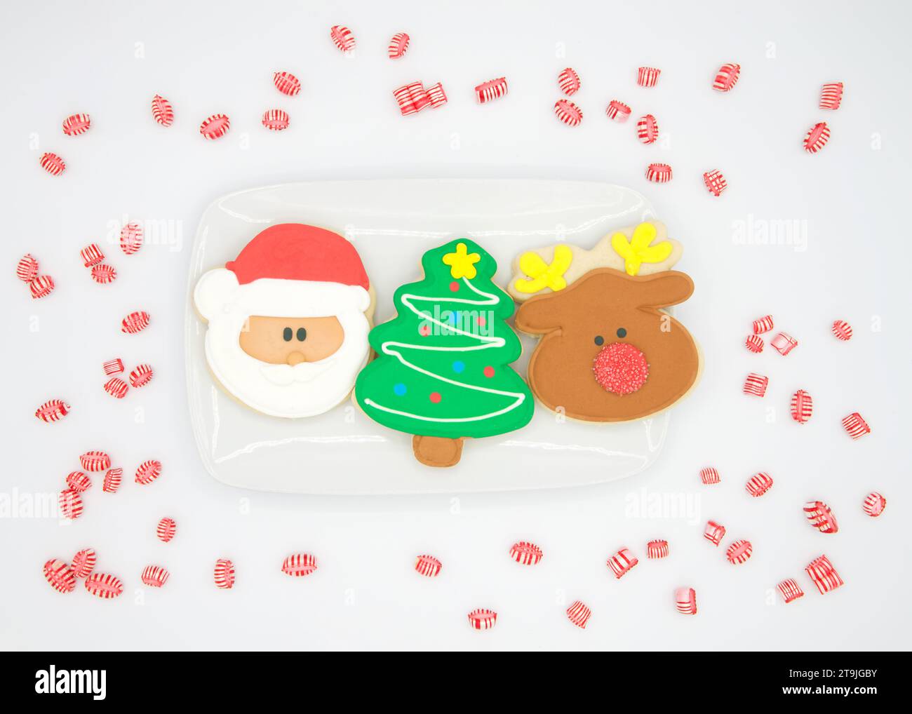 Top view flat lay of fancy decorated sugar cookies in Christmas shapes ...