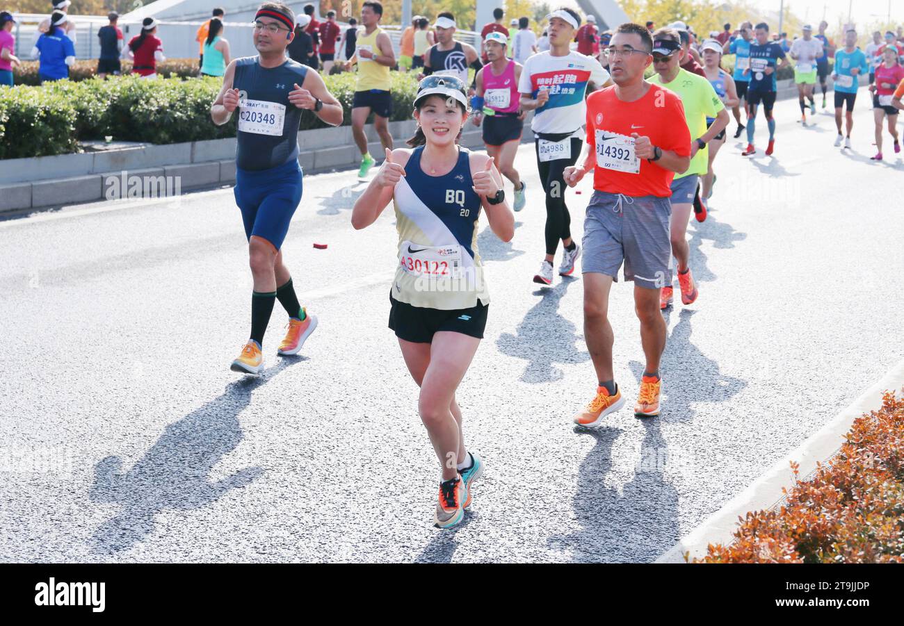 SHANGHAI, CHINA - NOVEMBER 26, 2023 - Runners compete in the Shanghai ...