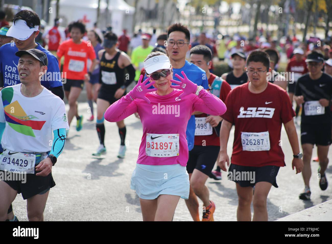 SHANGHAI, CHINA - NOVEMBER 26, 2023 - Runners compete in the Shanghai ...