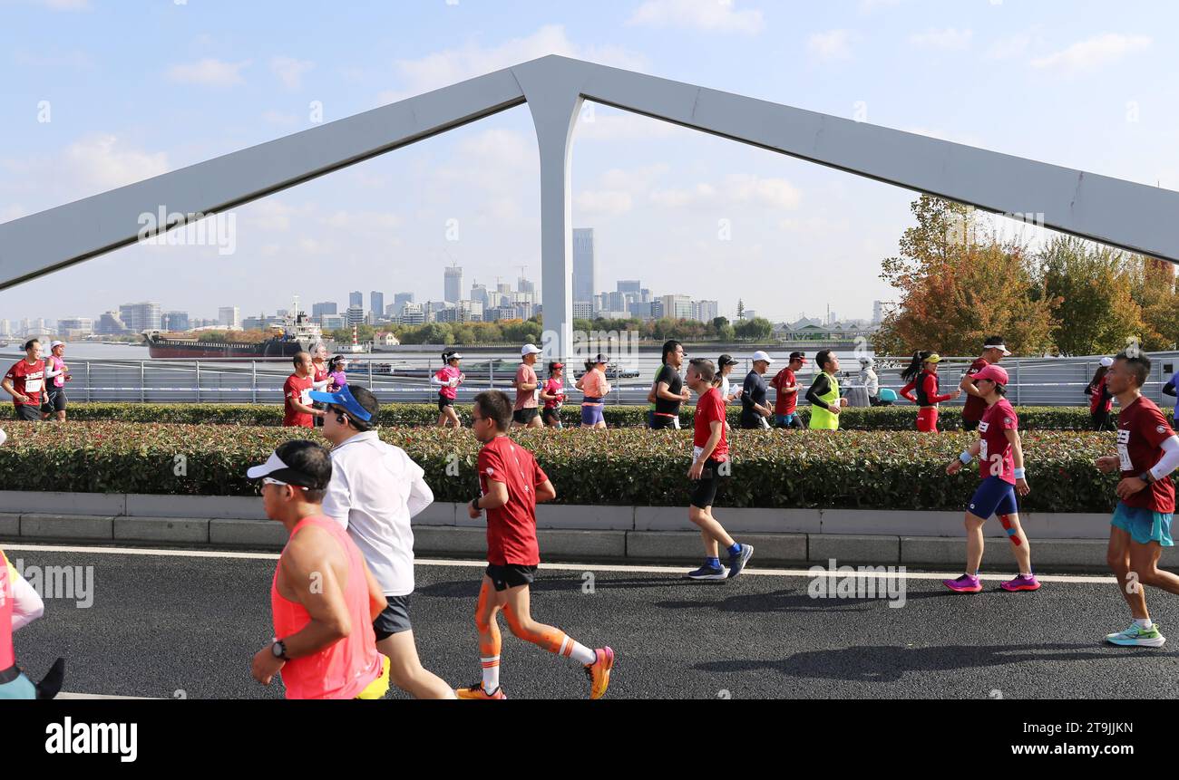 SHANGHAI, CHINA - NOVEMBER 26, 2023 - Runners compete in the Shanghai ...