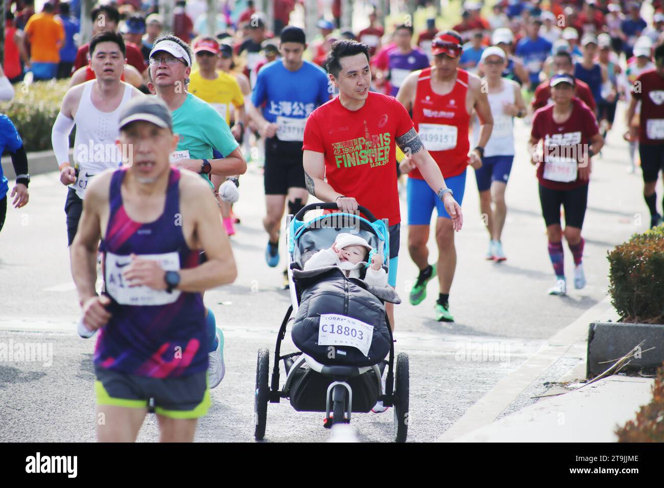 SHANGHAI, CHINA - NOVEMBER 26, 2023 - Runners compete in the Shanghai ...