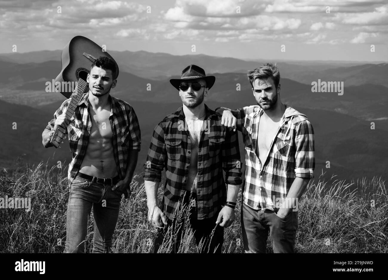 Group of men friends hiking. Outdoor music festival. Group of friends ...