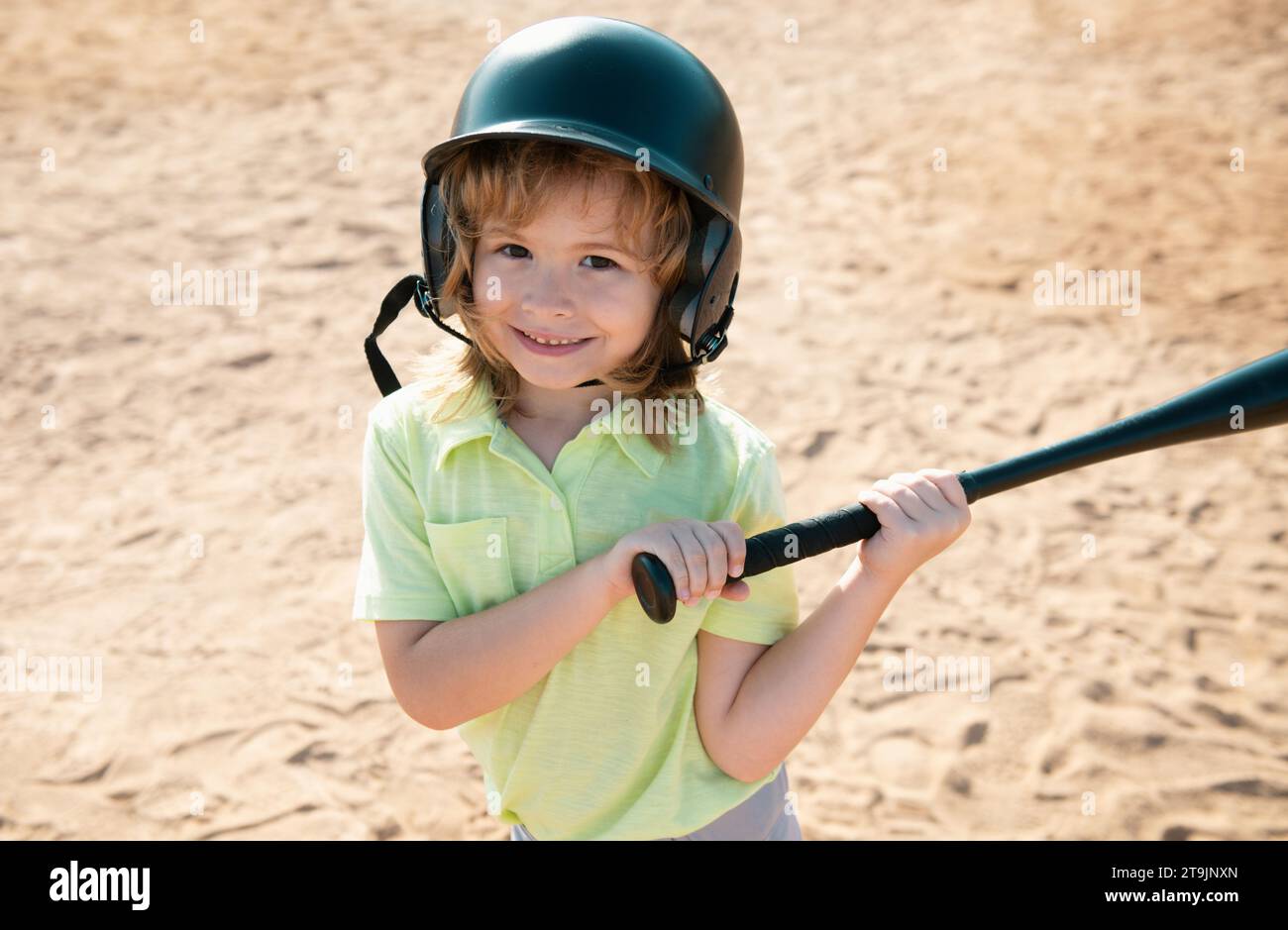 Kid holding a baseball bat. Pitcher child about to throw in youth ...