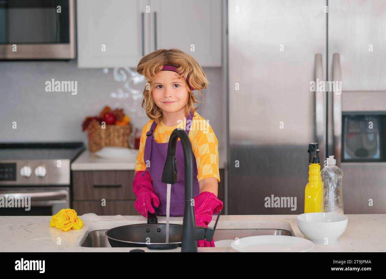 Adorable little helper child housekeeping. Little cute boy sweeping and ...