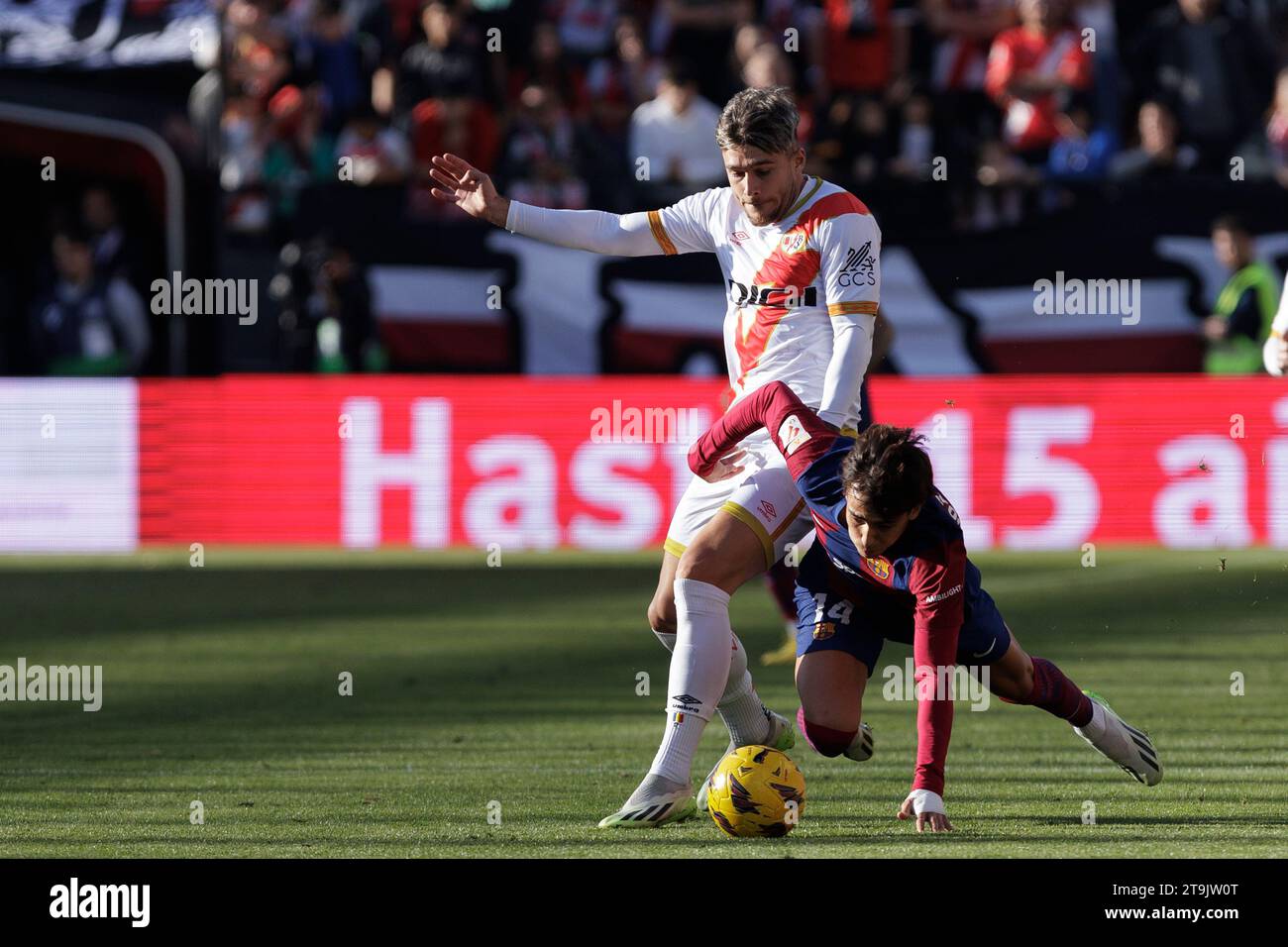 Madrid, Spain. 25th Nov, 2023. Joao Felix of Barcelona and Andrei Ratiu ...