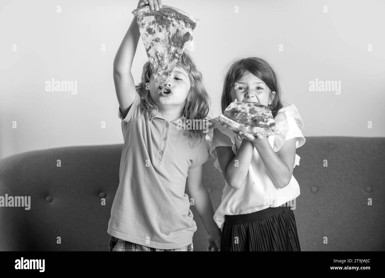 Pizza and kids, slices pizza in kids hand. Children eating tasty fast ...