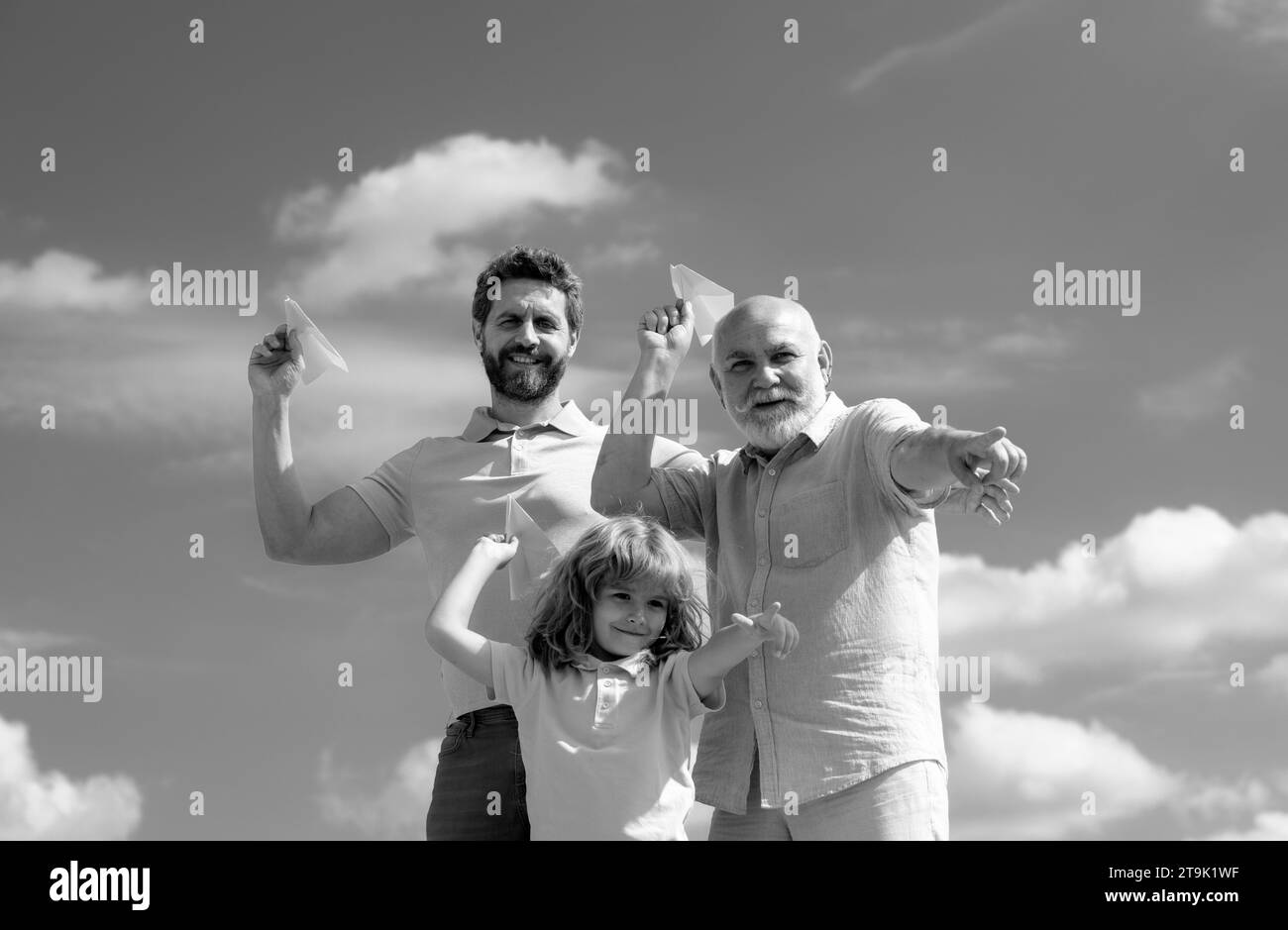 Three different generations ages grandfather father and child son ...