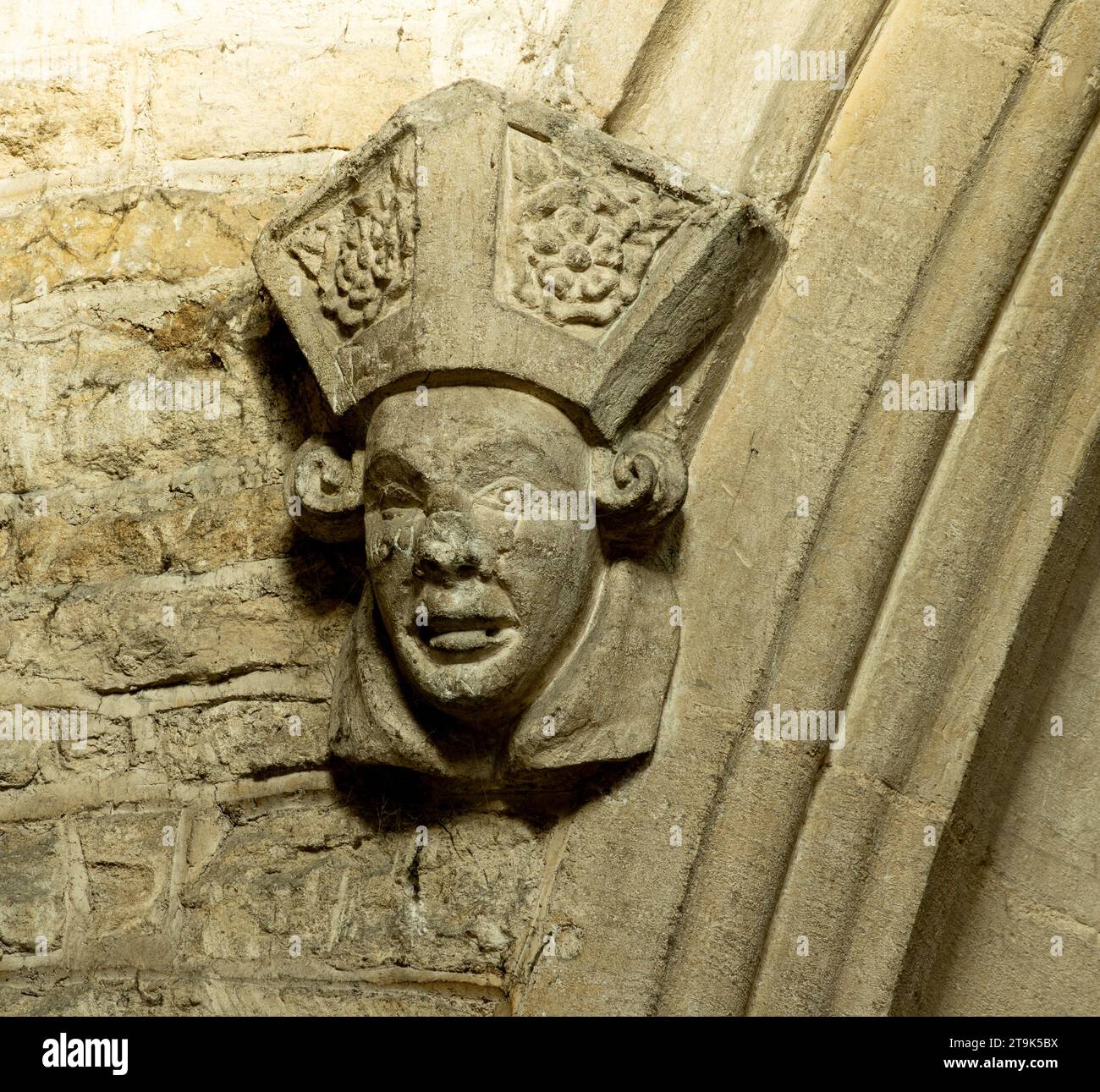 Carved stone head in St. John the Baptist Church, Burford, Oxfordshire ...