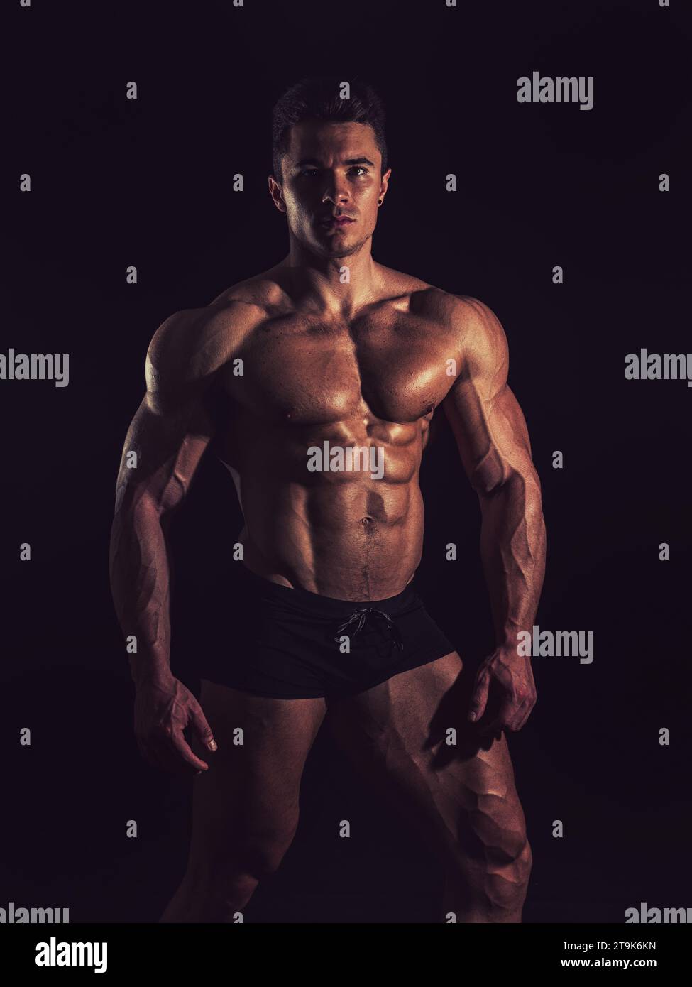A Strong Display of Masculinity: Flexing Muscles and Striking a Pose in ...