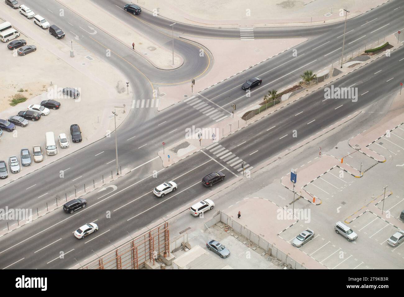 Roadway, motorway, cars on the road, intersection with traffic lights ...