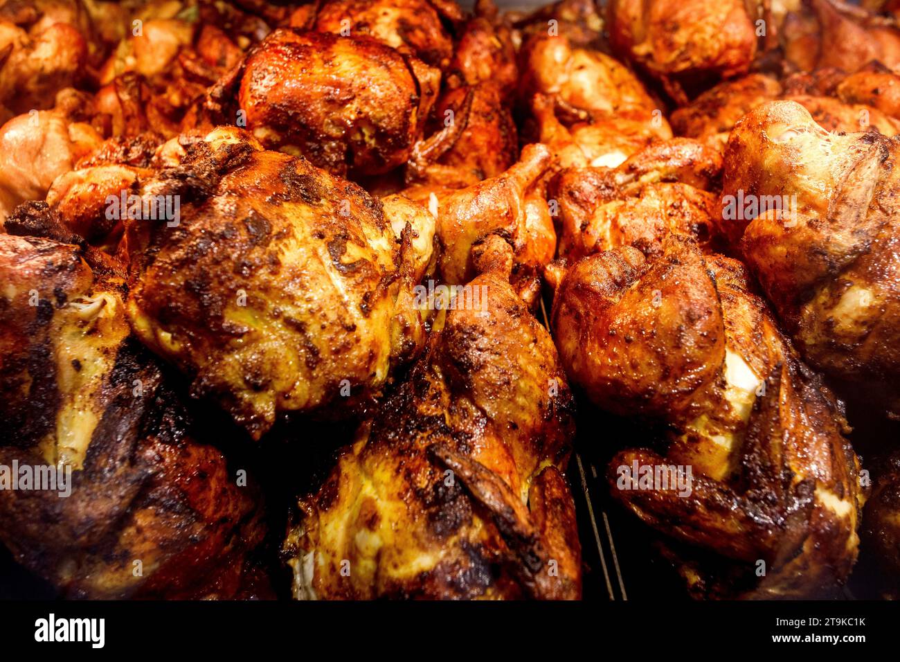 Grilled chickens cooked, whole chicken fried, piled in bulk, in ...