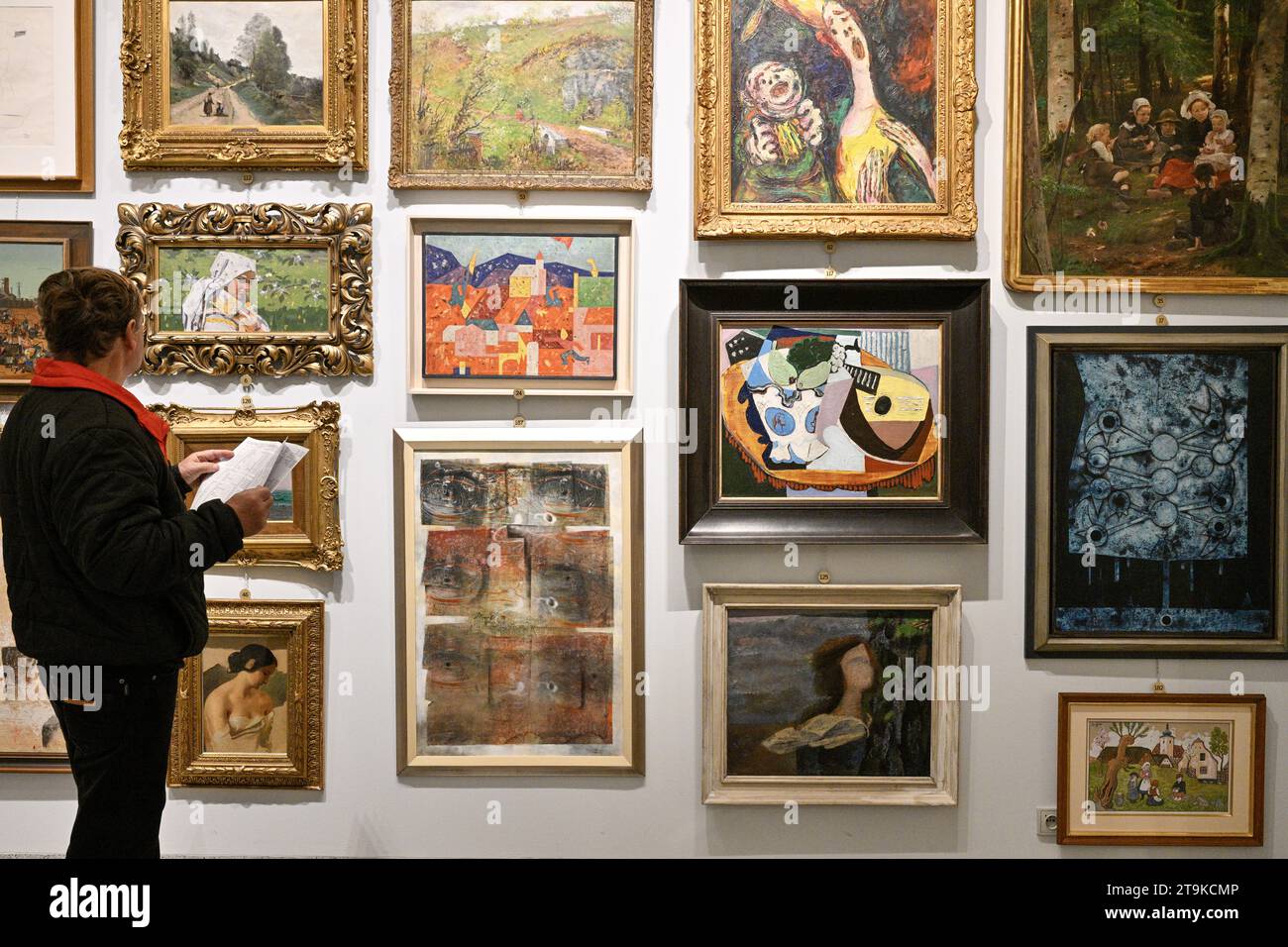 Prague, Czech Republic. 25th Nov, 2023. Paintings on display within the ...
