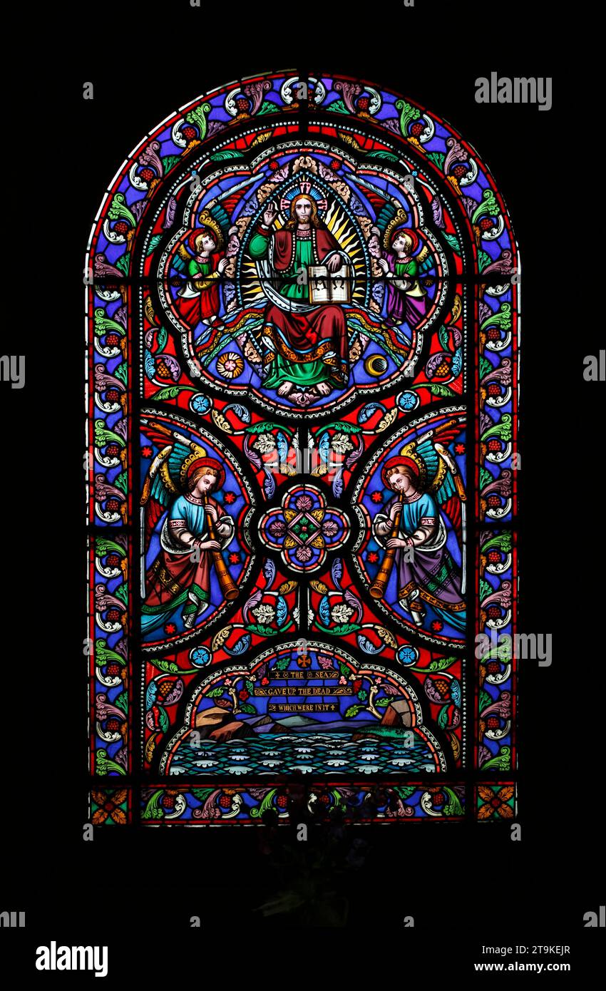 Stained glass window depicting musicians playing musical instruments ...