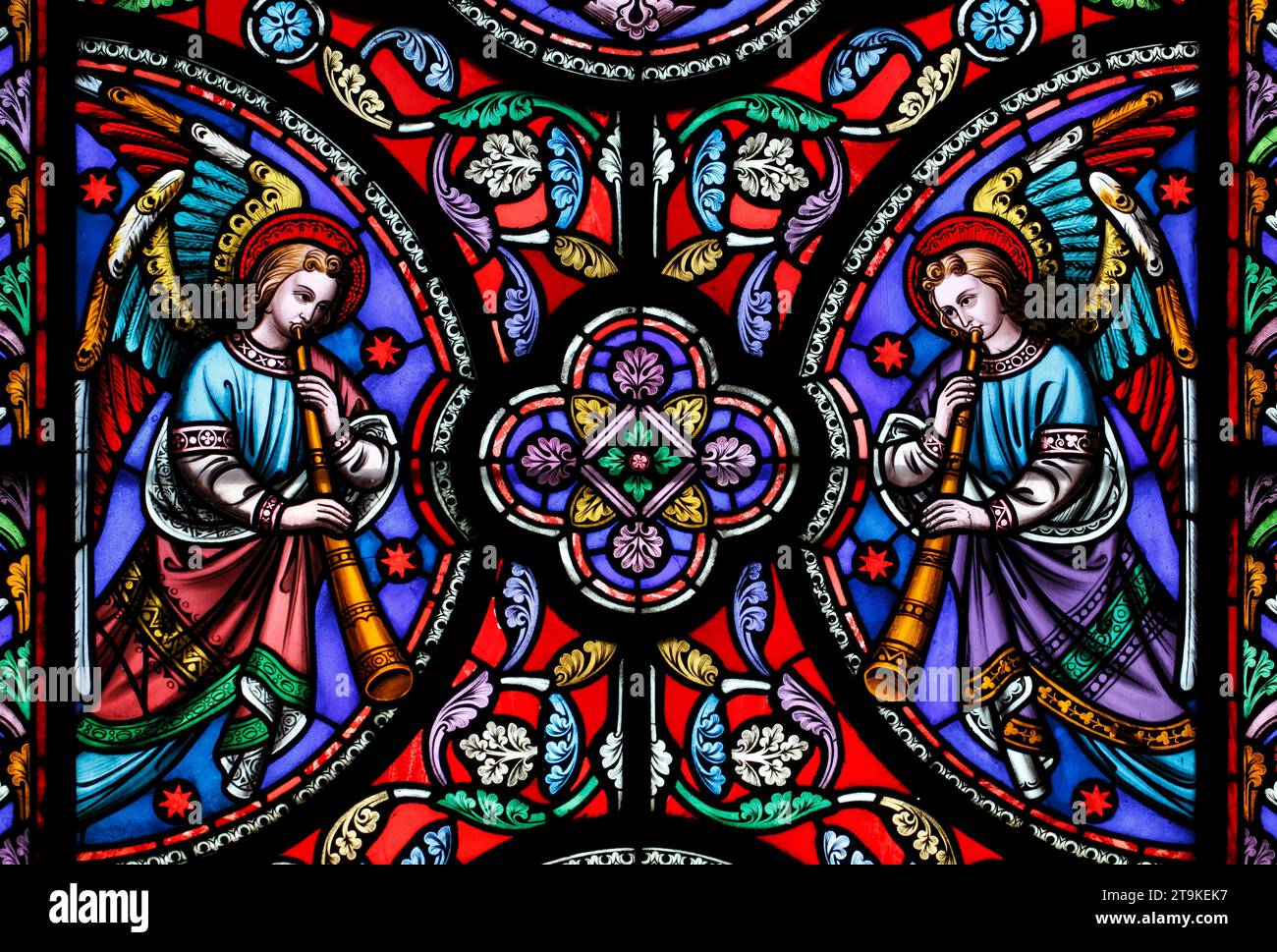 Stained glass window depicting musicians playing musical instruments ...