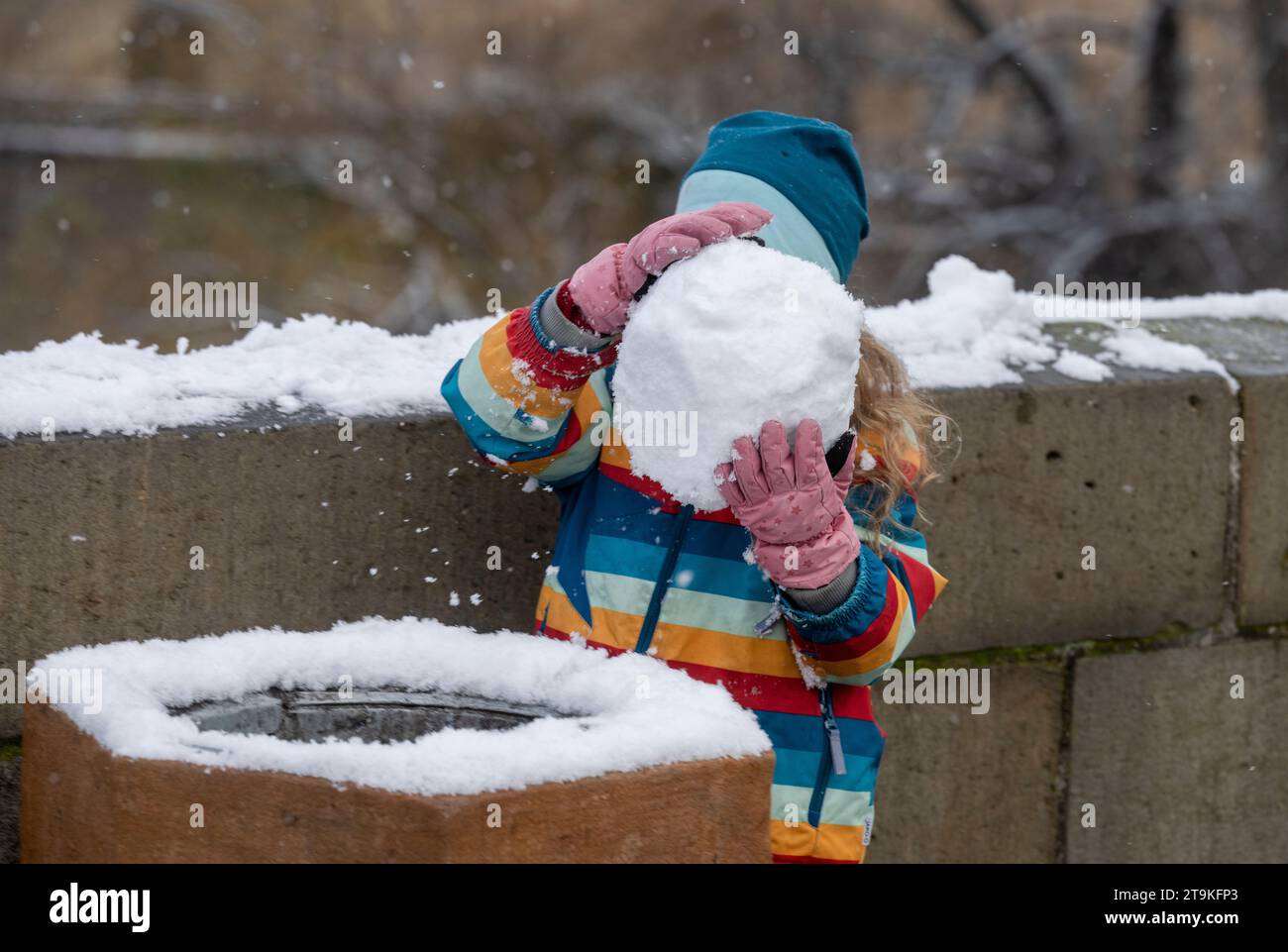 Prague, Czech Republic. 26th Nov, 2023. A girl with a snowball is seen ...