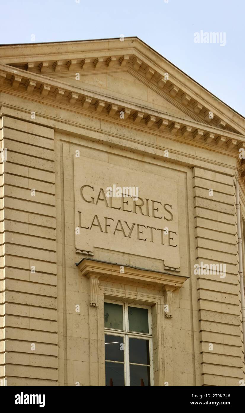 Shop name engraved on the exterior stone facade of the Galeries ...