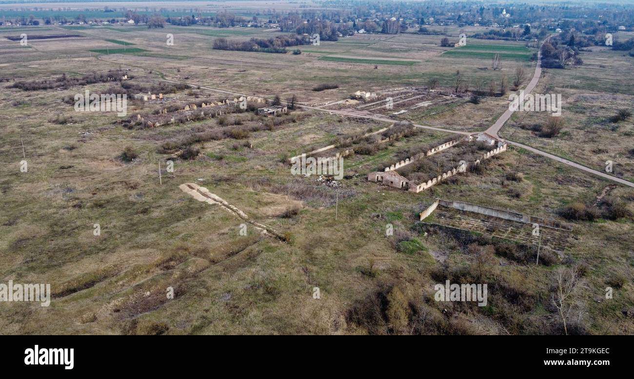 The ruins of a livestock farm, aerial view. Destroyed animal sheds ...