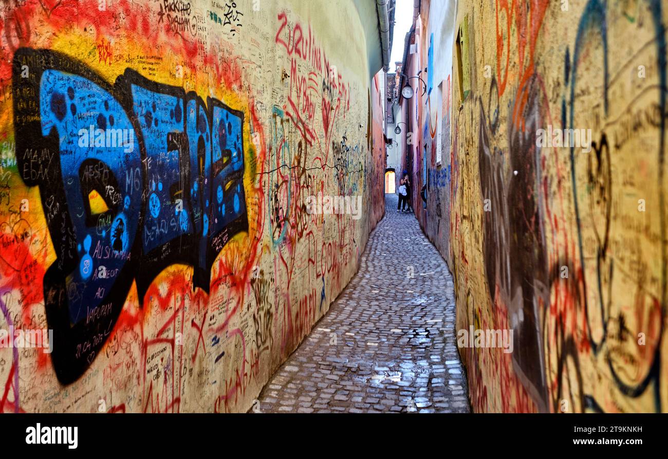 Visitors at the narrowest street in the city, Strada Sforii, in Brașov ...