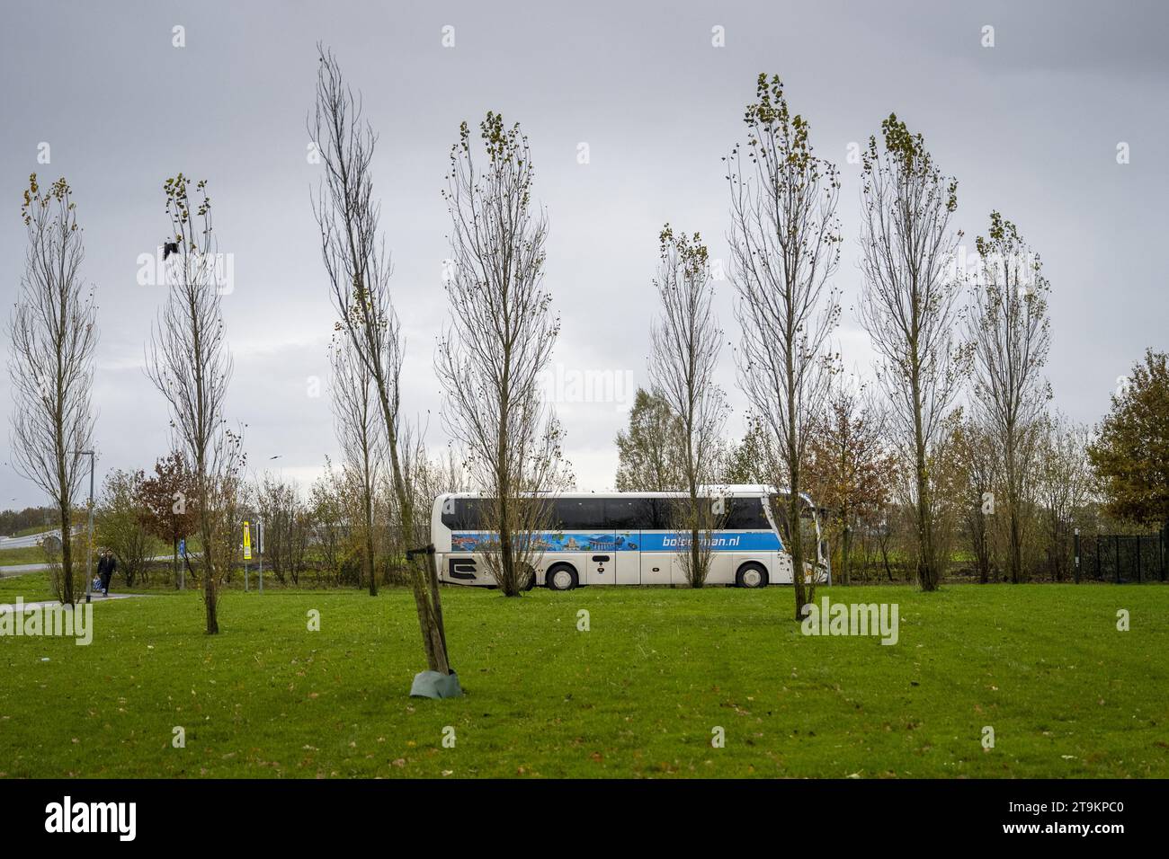 TER APEL - Asylum seekers leave from the registration center in Ter ...
