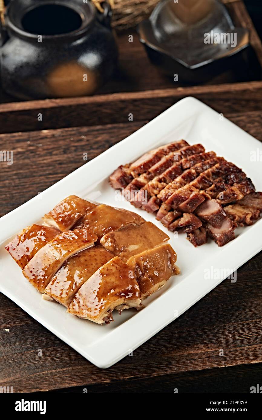 ROASTED GOOSE and Char Siu - Honey barbecue roast pork platter Stock ...