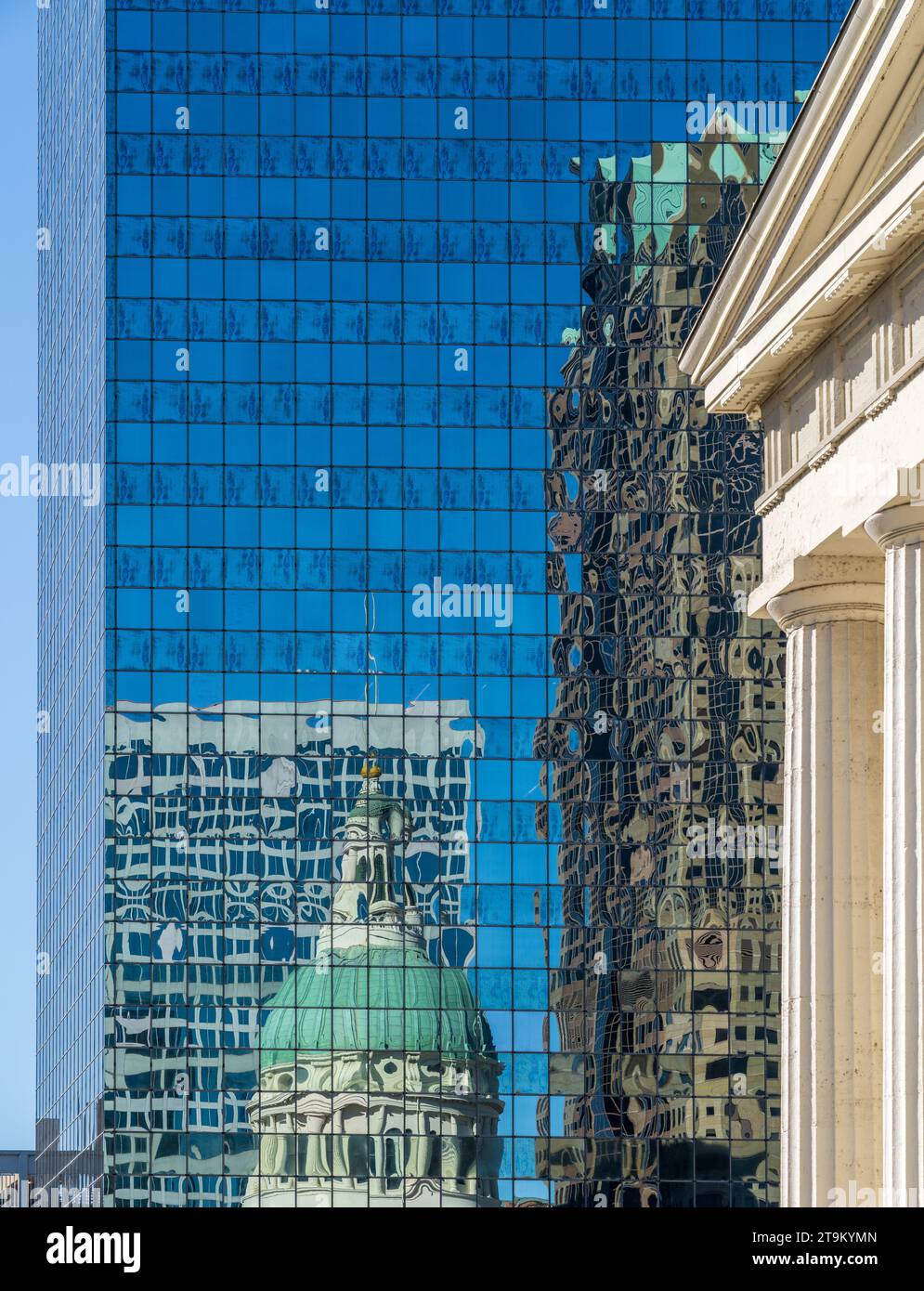 Reflections of Old Courthouse and modern office skyscraper in a ...
