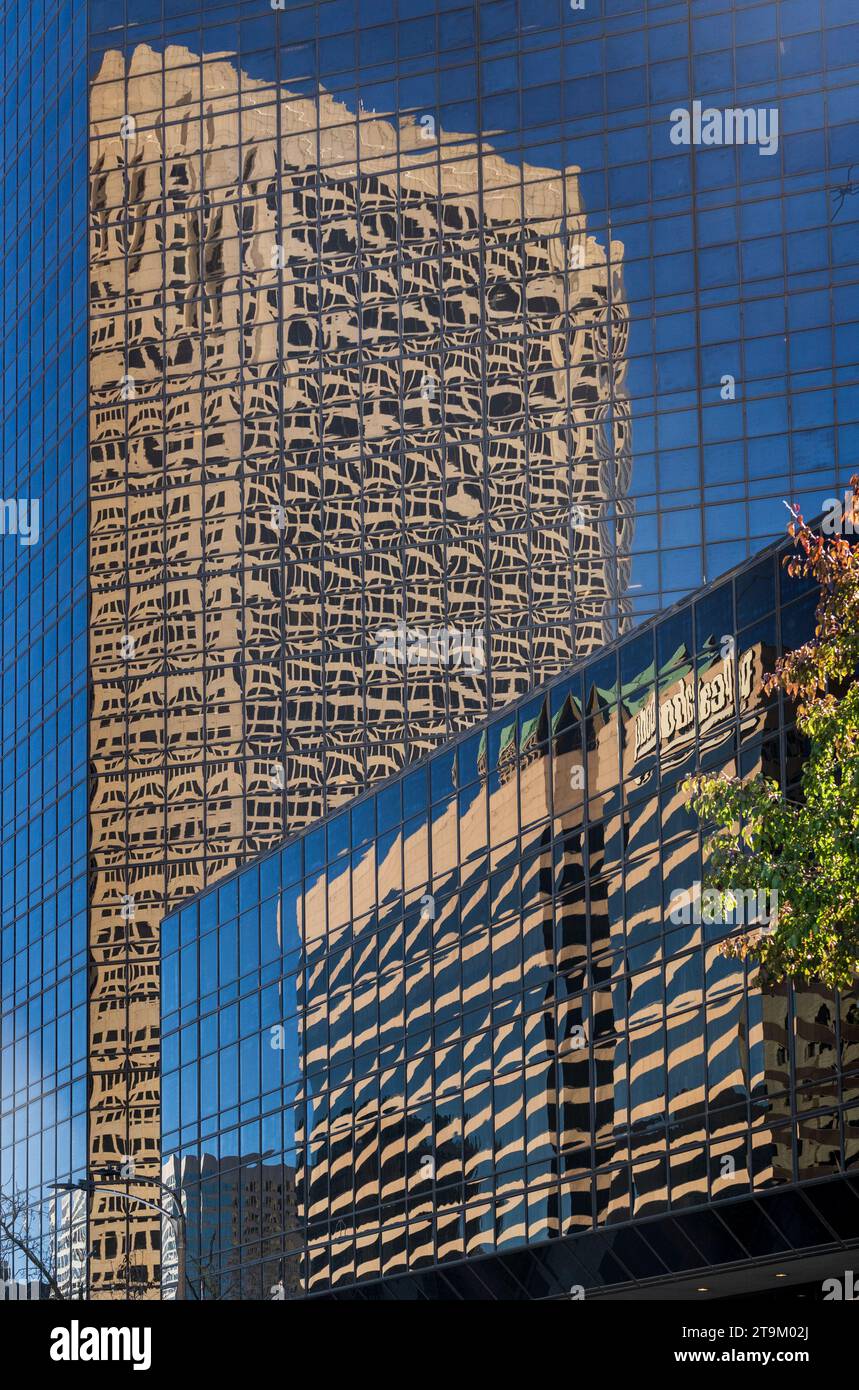 Reflections in mirrored facade in a modern building hi-res stock ...