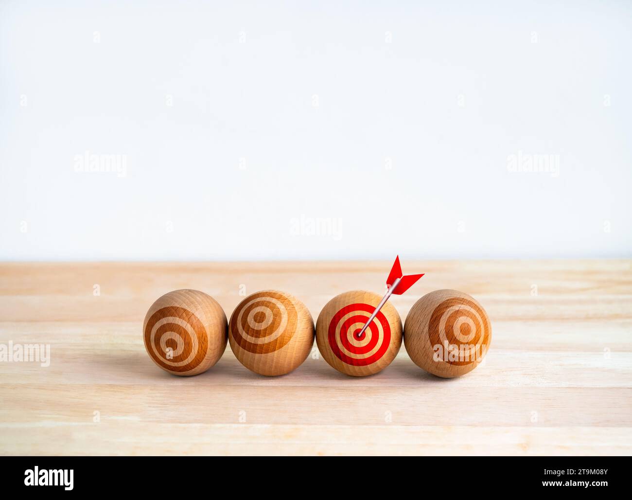 Focus on the right target, objective, business goals concepts. Red ...