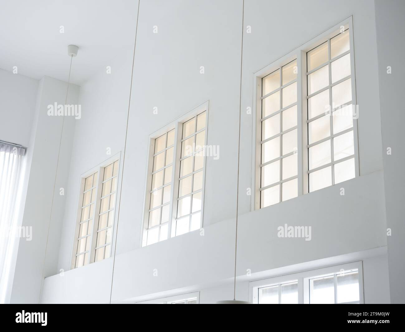 The tall vintage glass bay window, minimal style living room. Bright ...