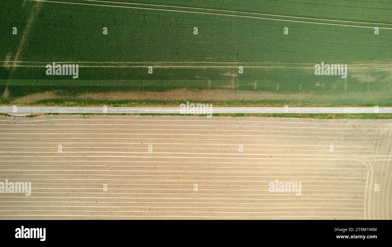 This image displays an aerial view of agricultural land, showcasing the ...