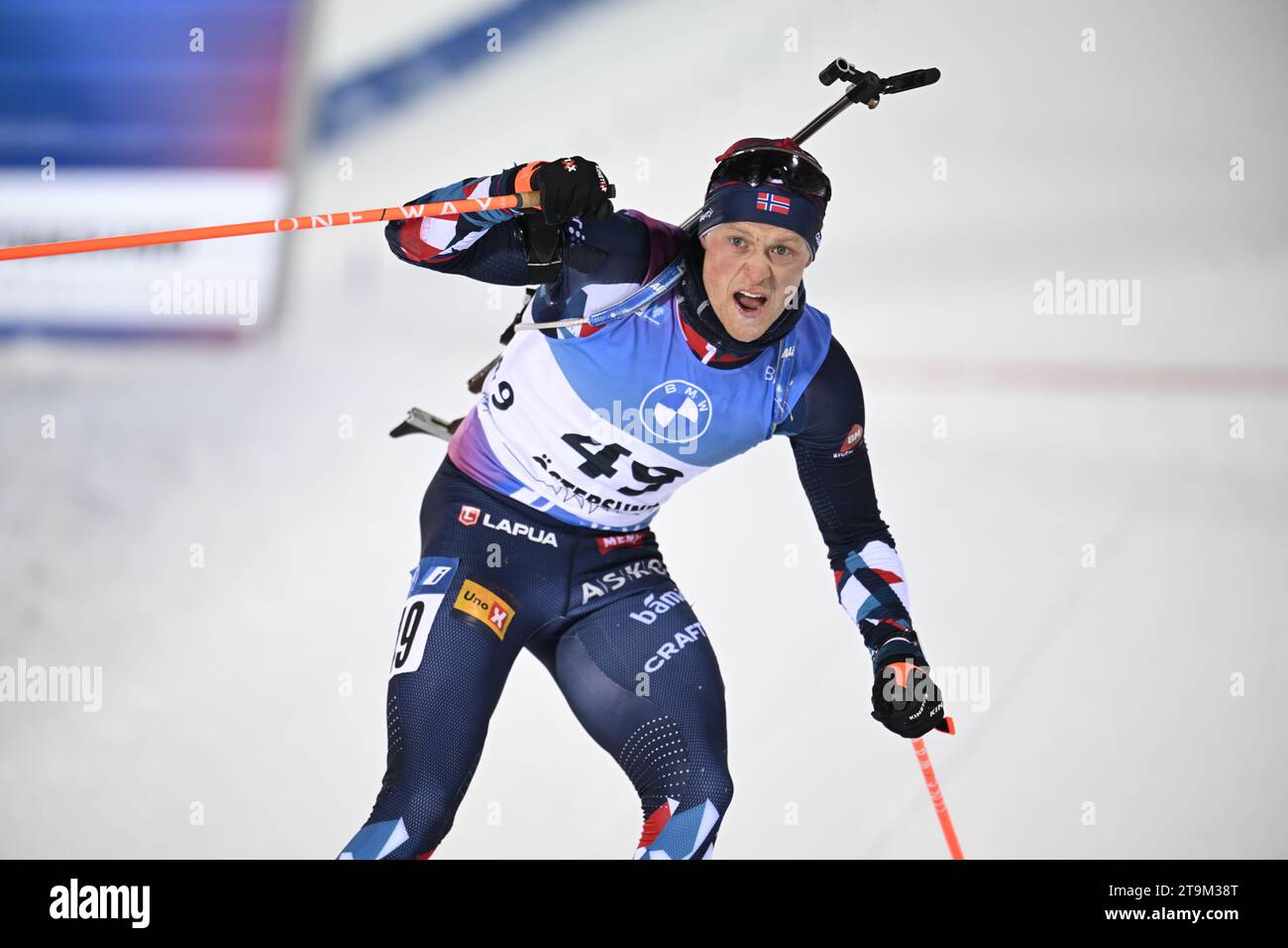 Endre Stromsheim of Norway crosses the finish line during the the men's ...