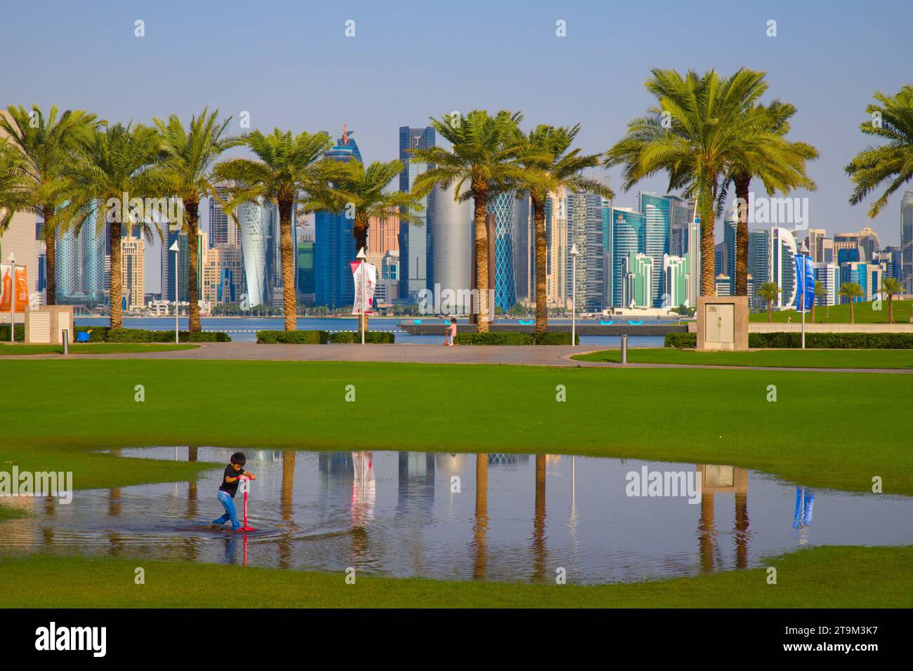 Qatar, Doha, skyline, MIA Park, people, children Stock Photo - Alamy