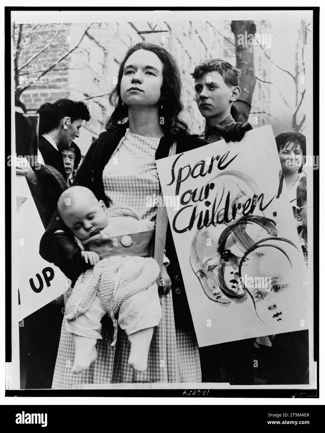 Little Denise Davidson, 5 months old, sleeps peacefully while her ...