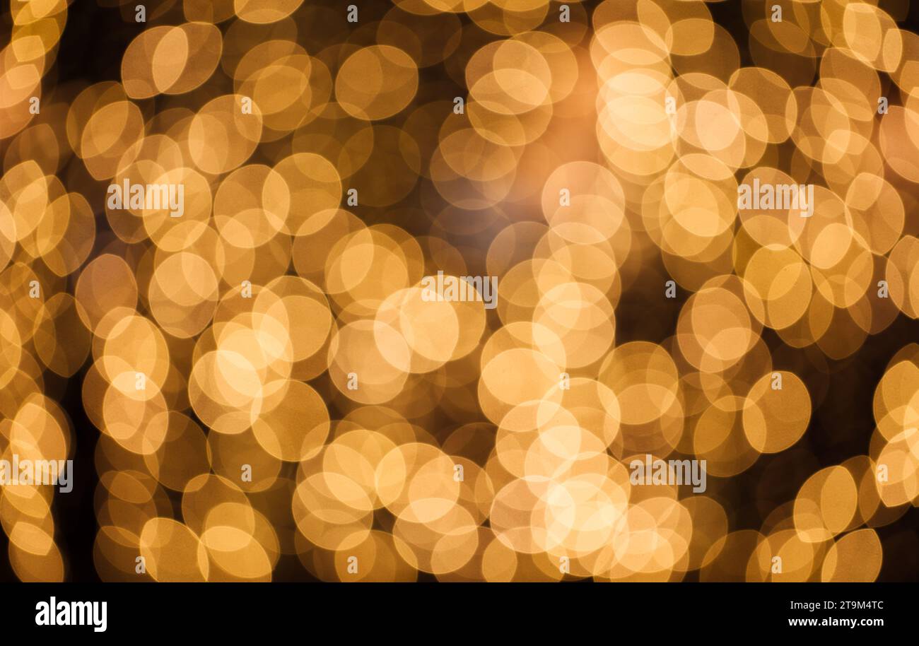 Glares spherical yellow from the spot lights in out-of-focus blurry ...