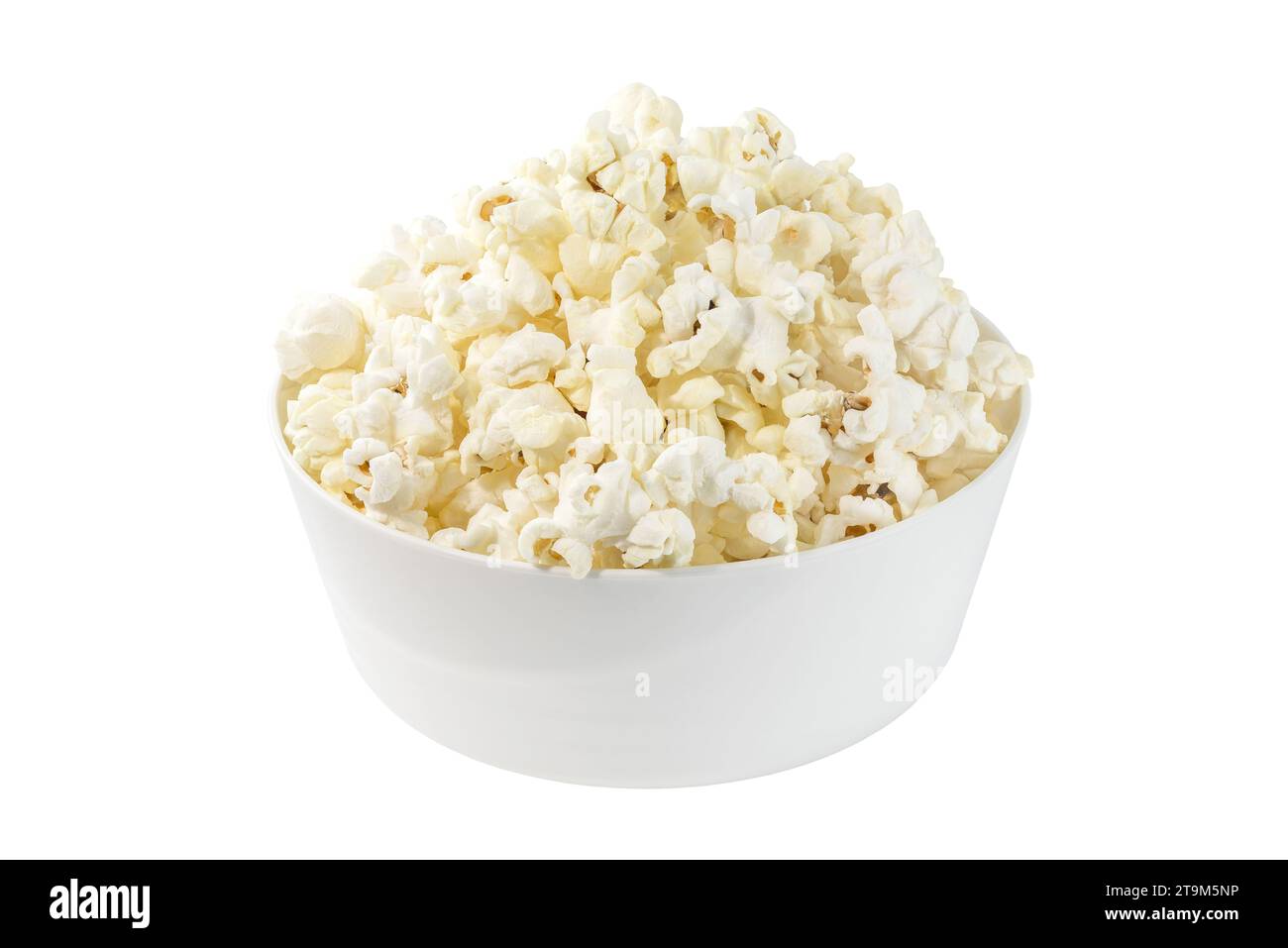 Popcorn, cooked corn, poured into a white bowl, isolated on white ...