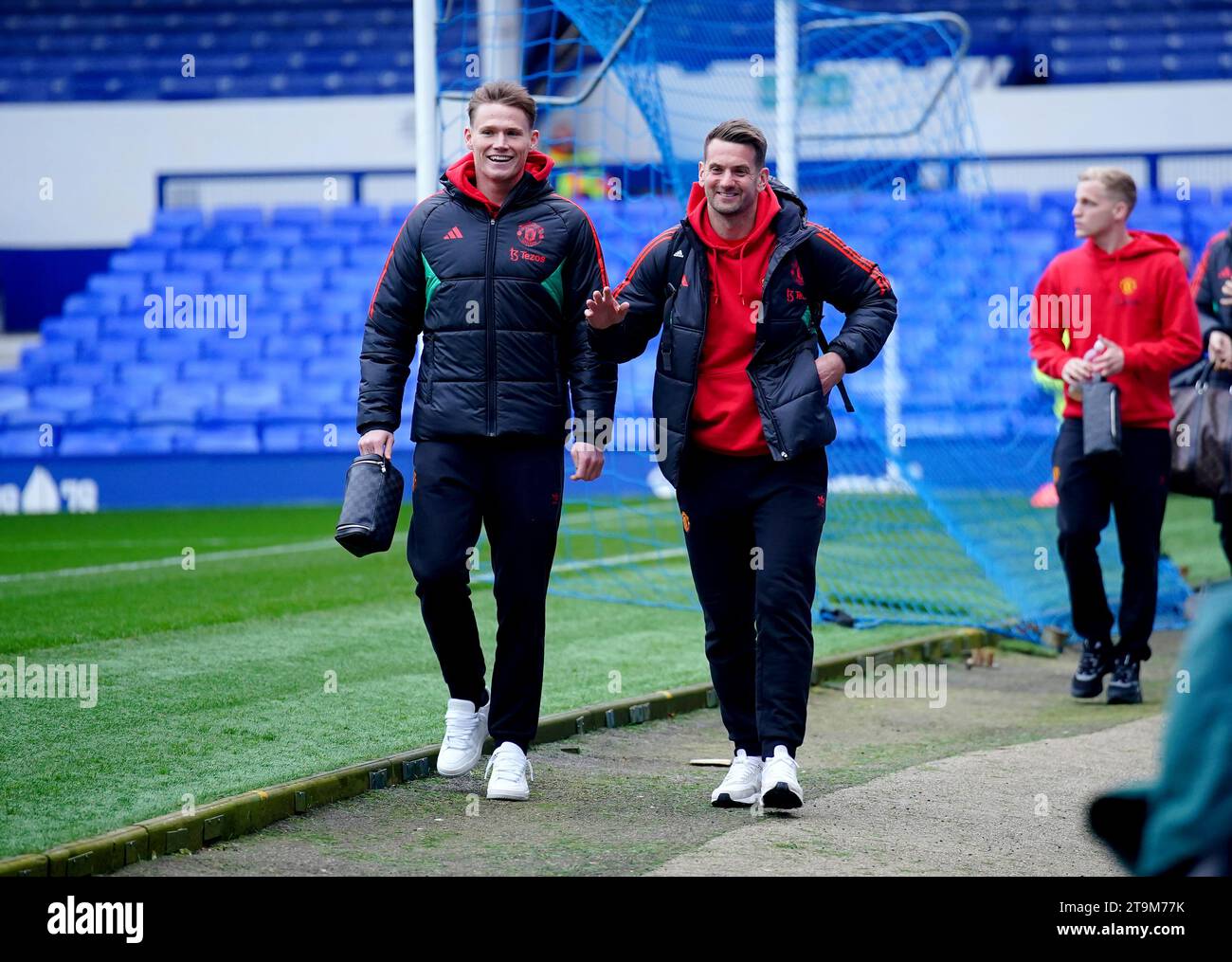 Manchester United goalkeeper Tom Heaton (right) and Scott McTominay ...