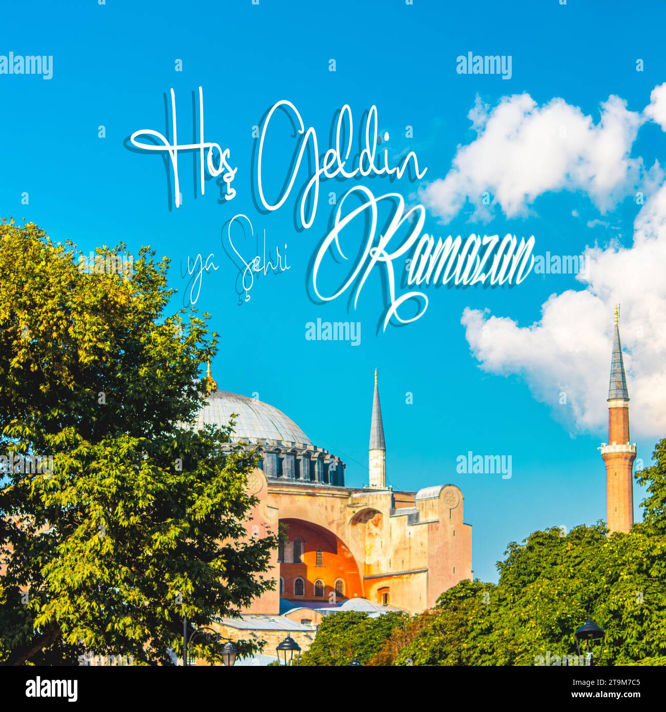 Hos Geldin Ya Sehri Ramazan or Ramazan Kareem. Hagia Sophia Mosque on cloudy blue sky background ...