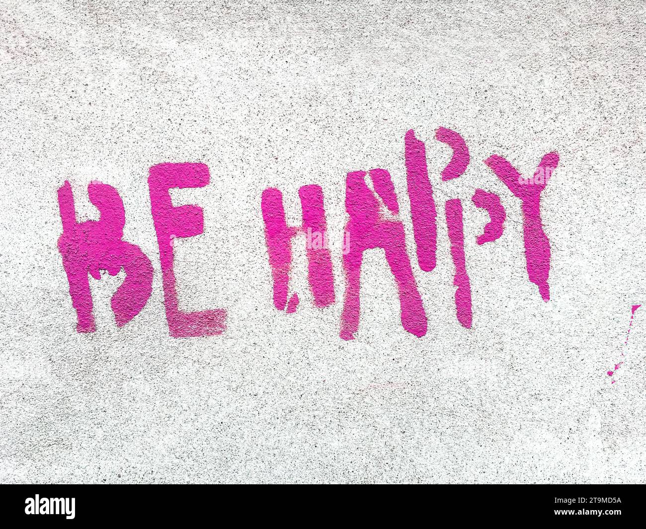 Pink Be happy written in graffiti style with rough texture isolated on ...