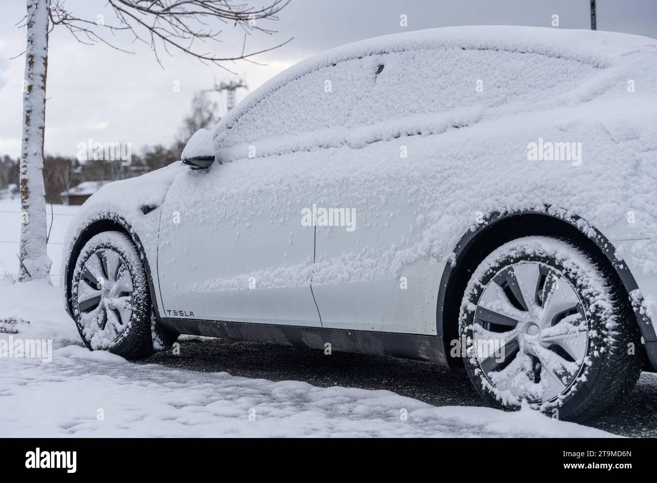 Bavaria, Germany - November 26, 2023: A snow-covered electric car of ...