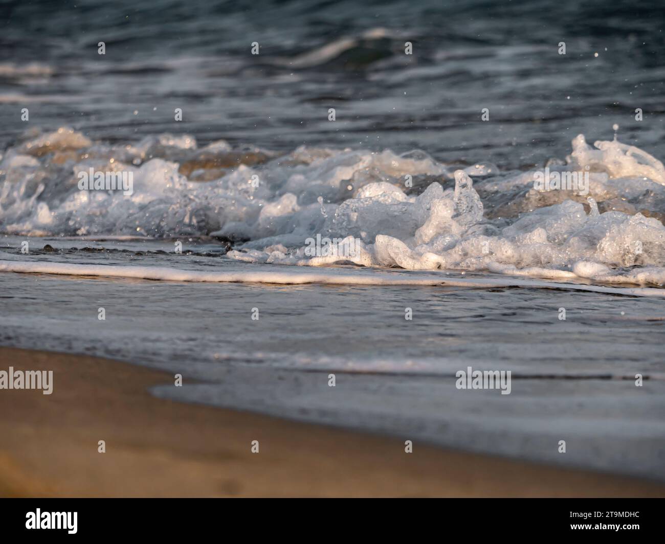 wave splash sea beach macro, close up Stock Photo - Alamy
