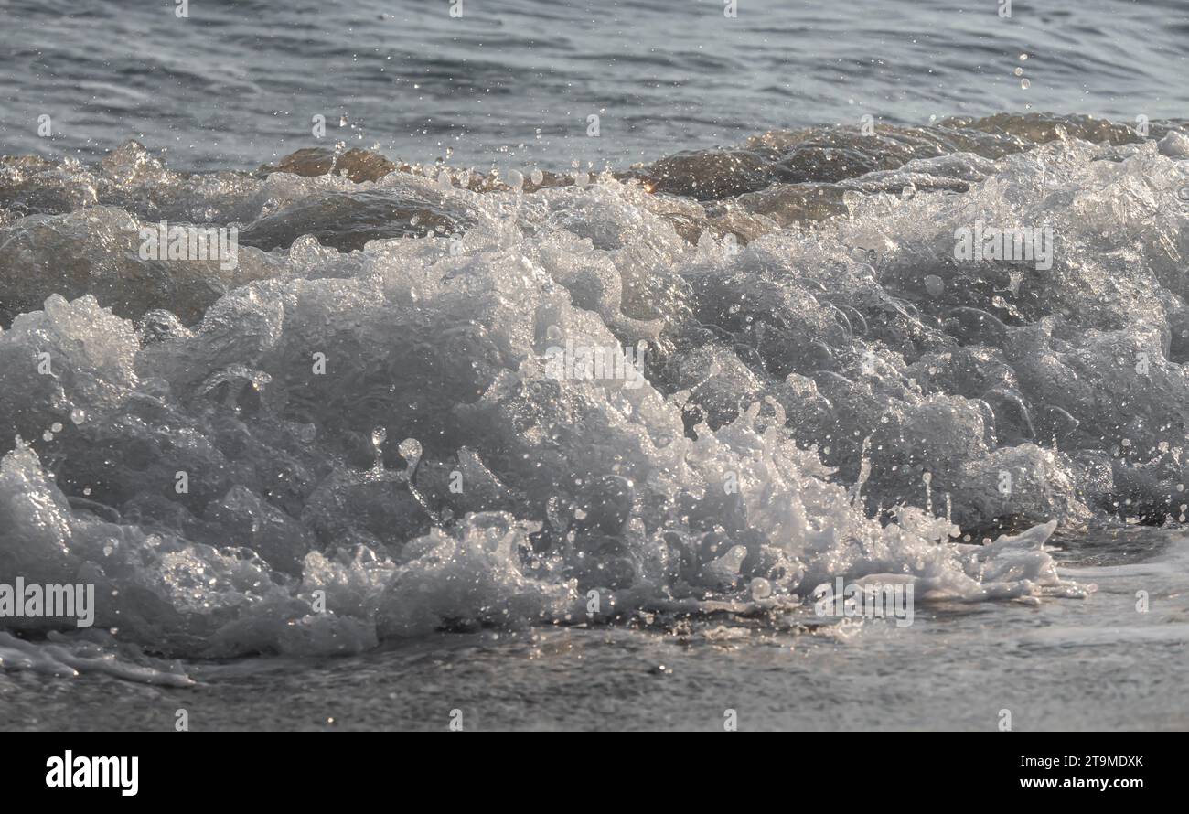 wave splash sea beach macro, close up Stock Photo - Alamy