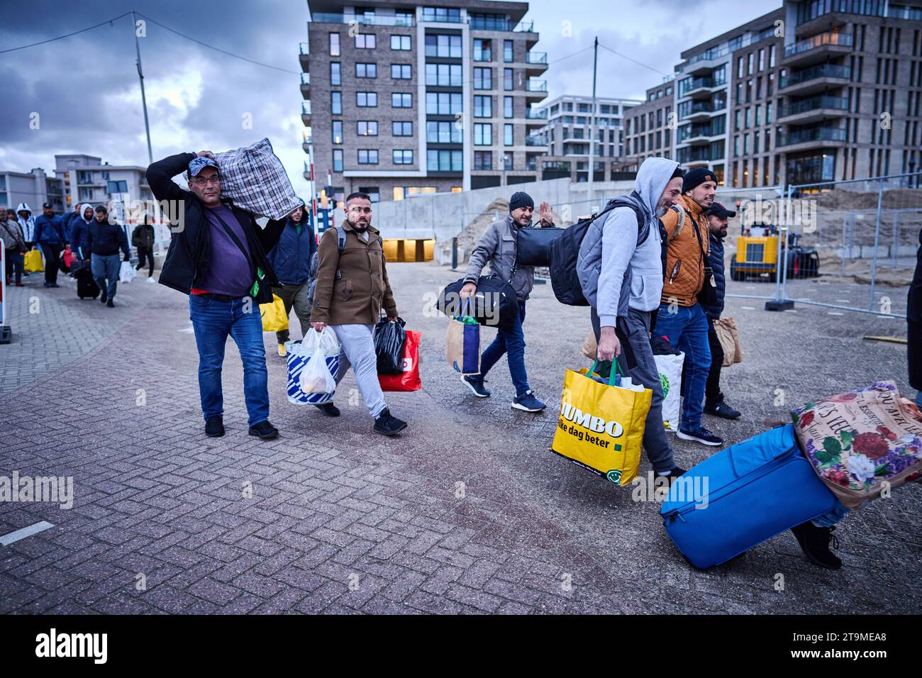THE HAGUE - Asylum seekers arrive at the NH Hotel in Kijkduin from the ...