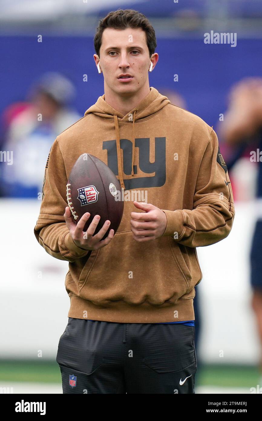 New York Giants quarterback Tommy DeVito warms up before playing ...