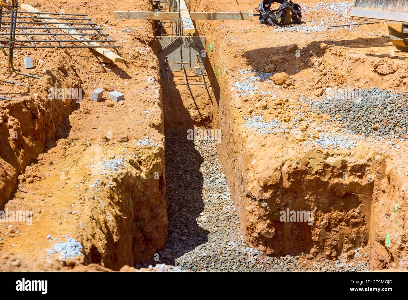 Trenches rebar prepation work for pouring concrete to house foundation ...